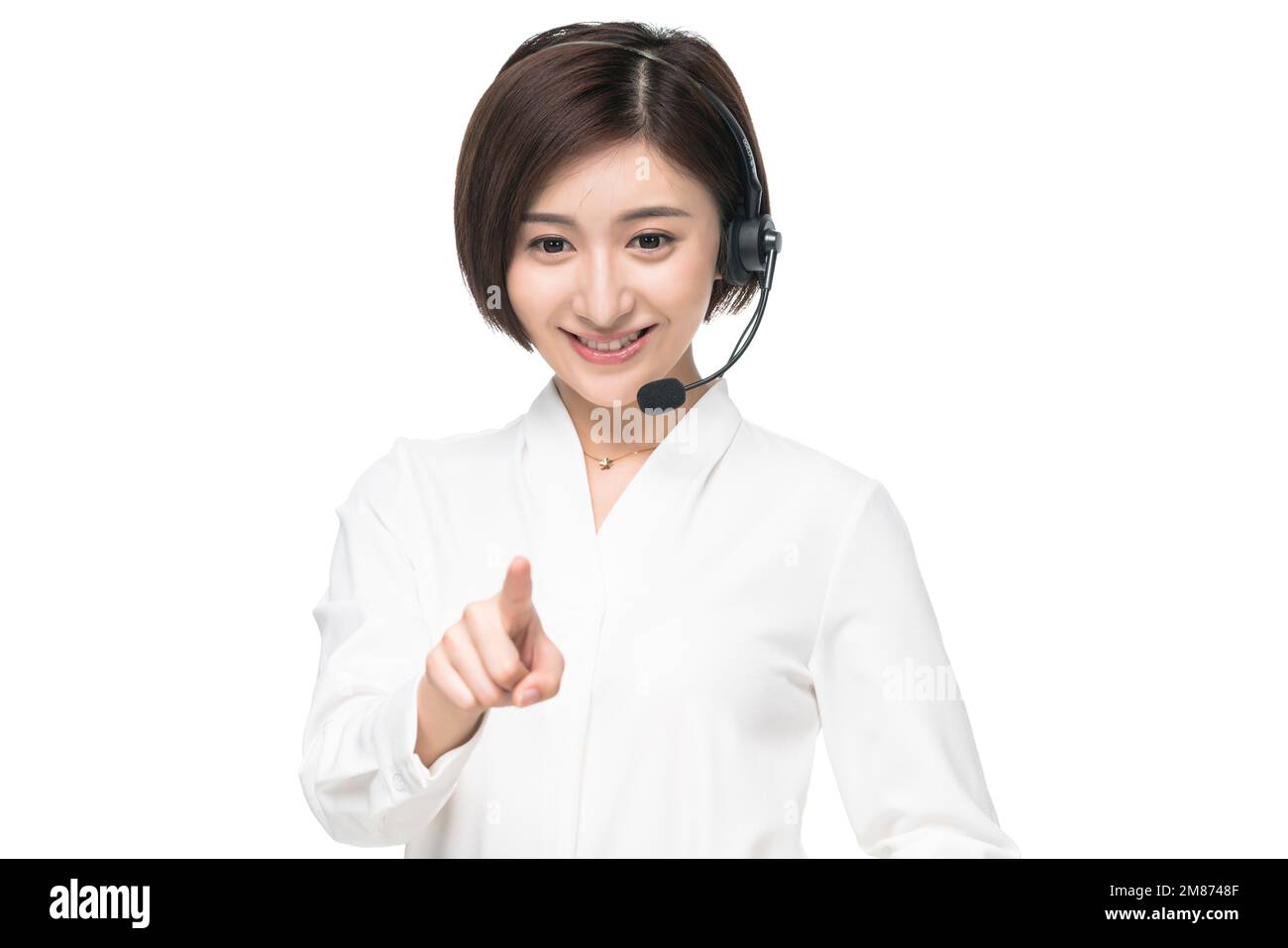 The female customer service staff wearing headphones Stock Photo - Alamy