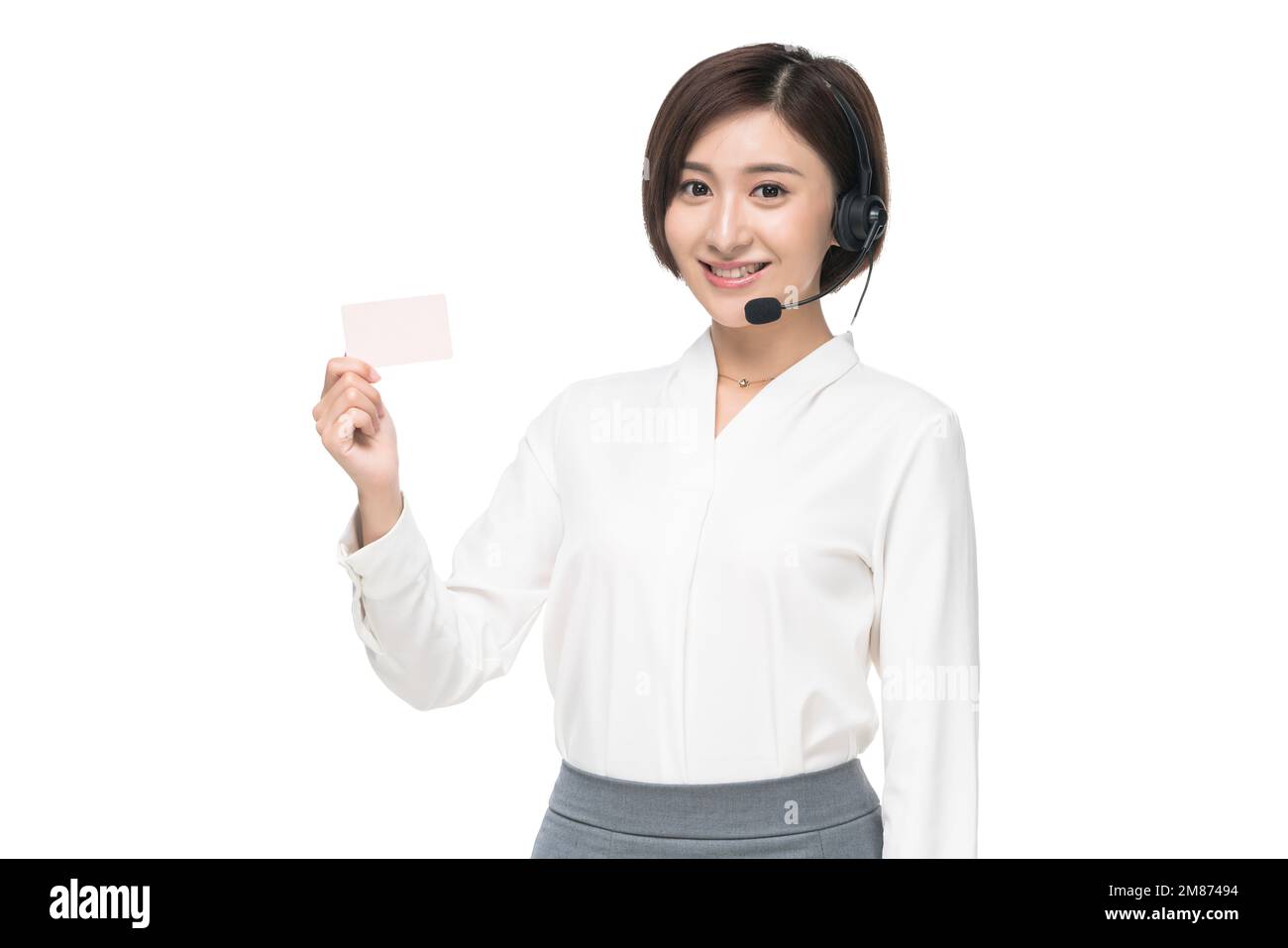 The female customer service staff wearing headphones Stock Photo - Alamy