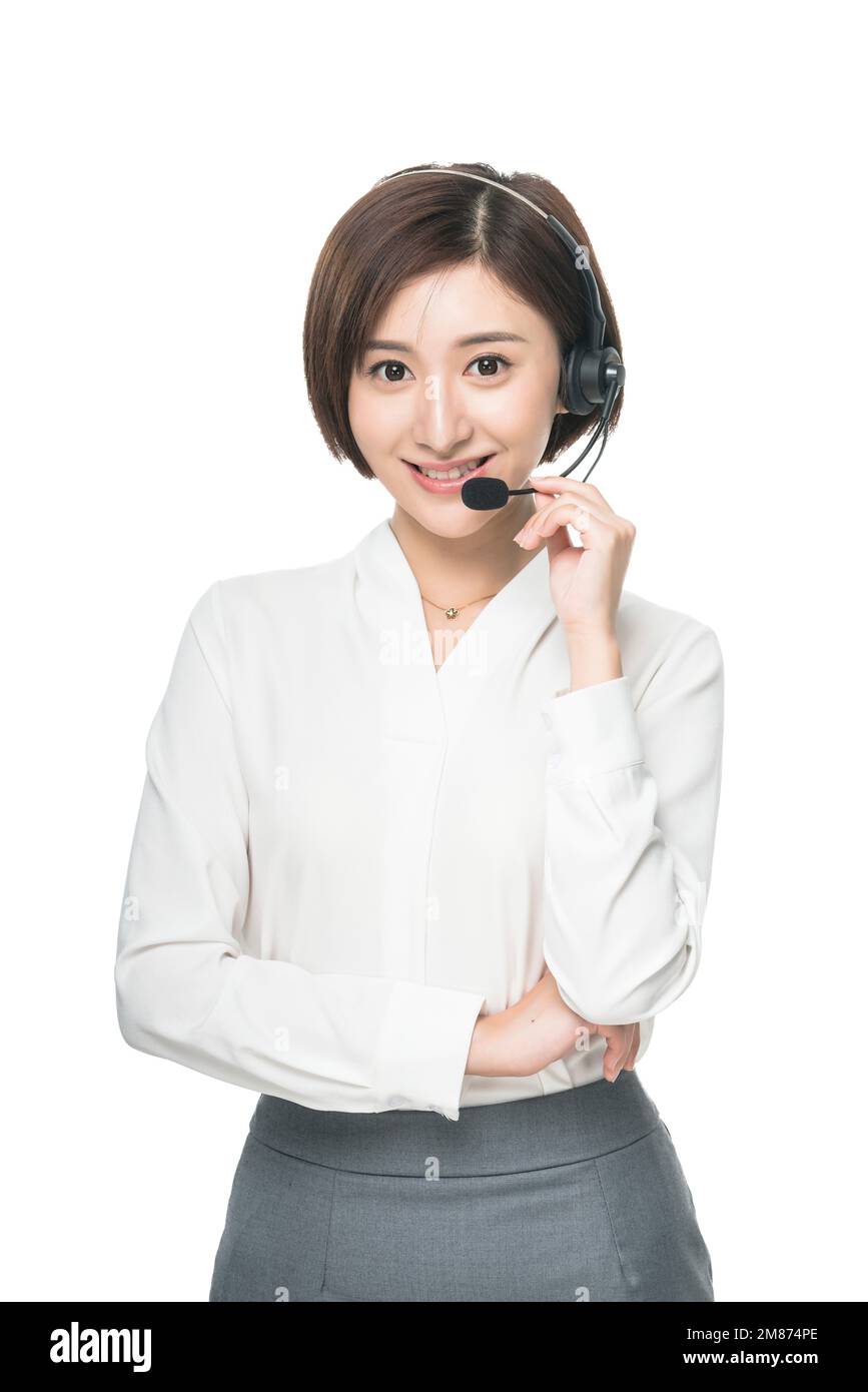 The female customer service staff wearing headphones Stock Photo - Alamy