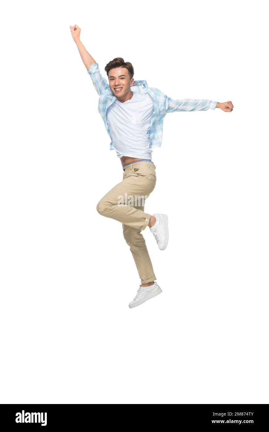 The young man jumps Stock Photo - Alamy