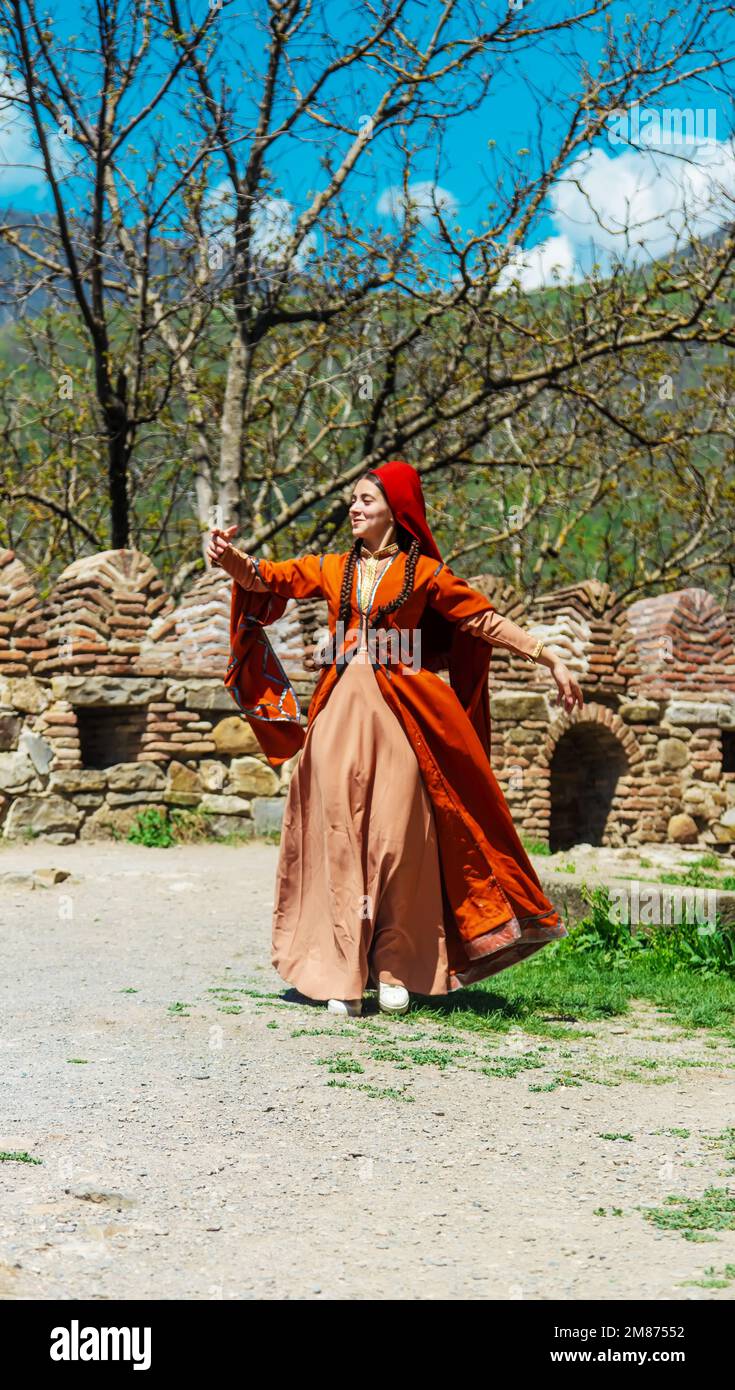 Georgian girl in national costume dances Georgian national dances ...