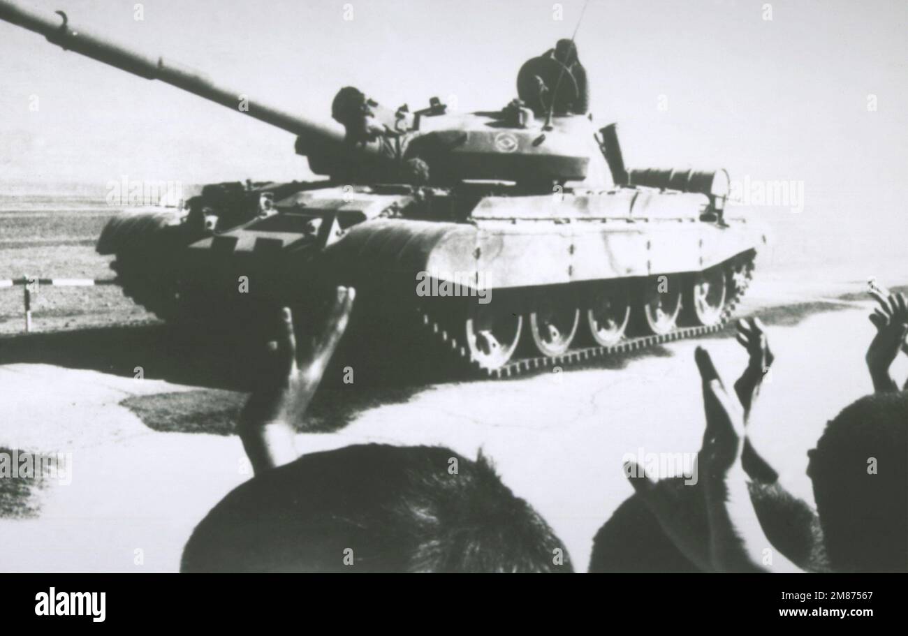 A Soviet T-62 main battle tank "withdraws" during a sham removal of ...