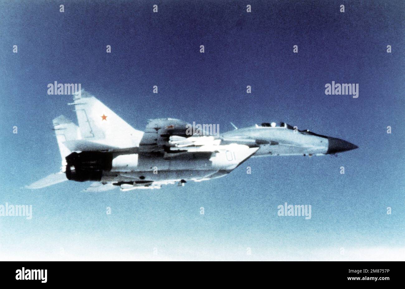An air-to-air right side view of a Soviet MiG-29 Fulcrum aircraft ...