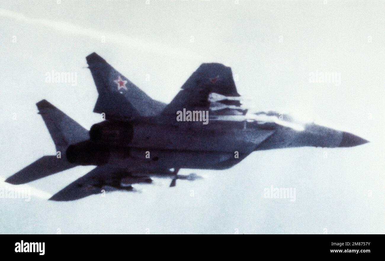 An air-to-air right underside view of a Soviet MiG-29 Fulcrum aircraft ...