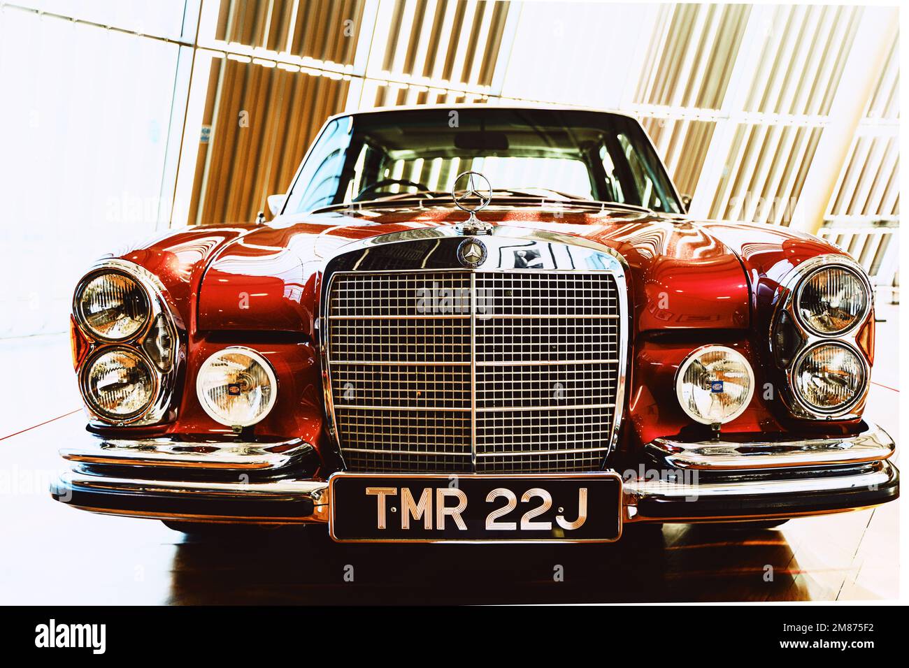 A luxury vintage red Mercedes Benz during exhibition in closeup Stock ...