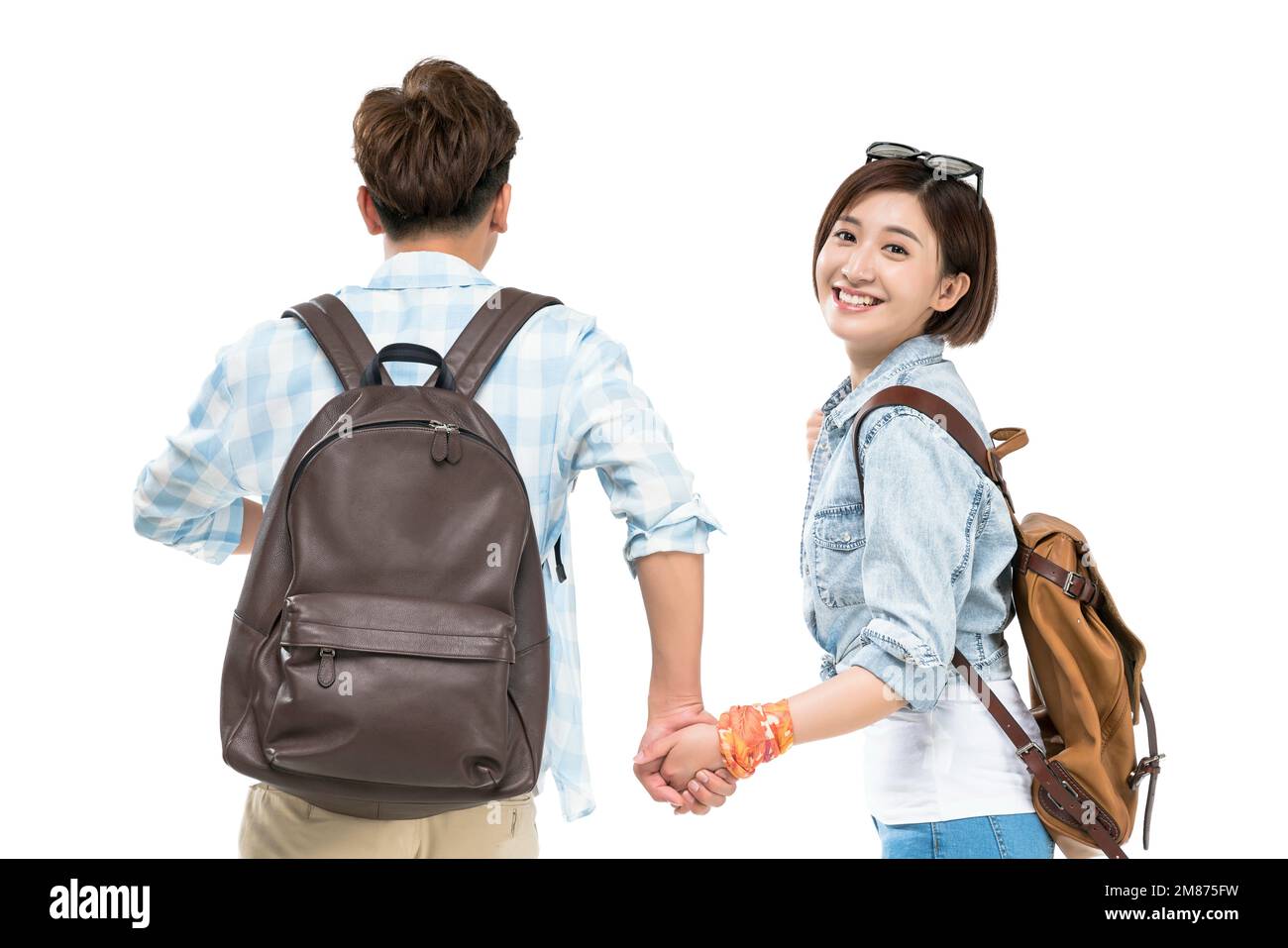 Couple holding hands back Cut Out Stock Images & Pictures - Alamy