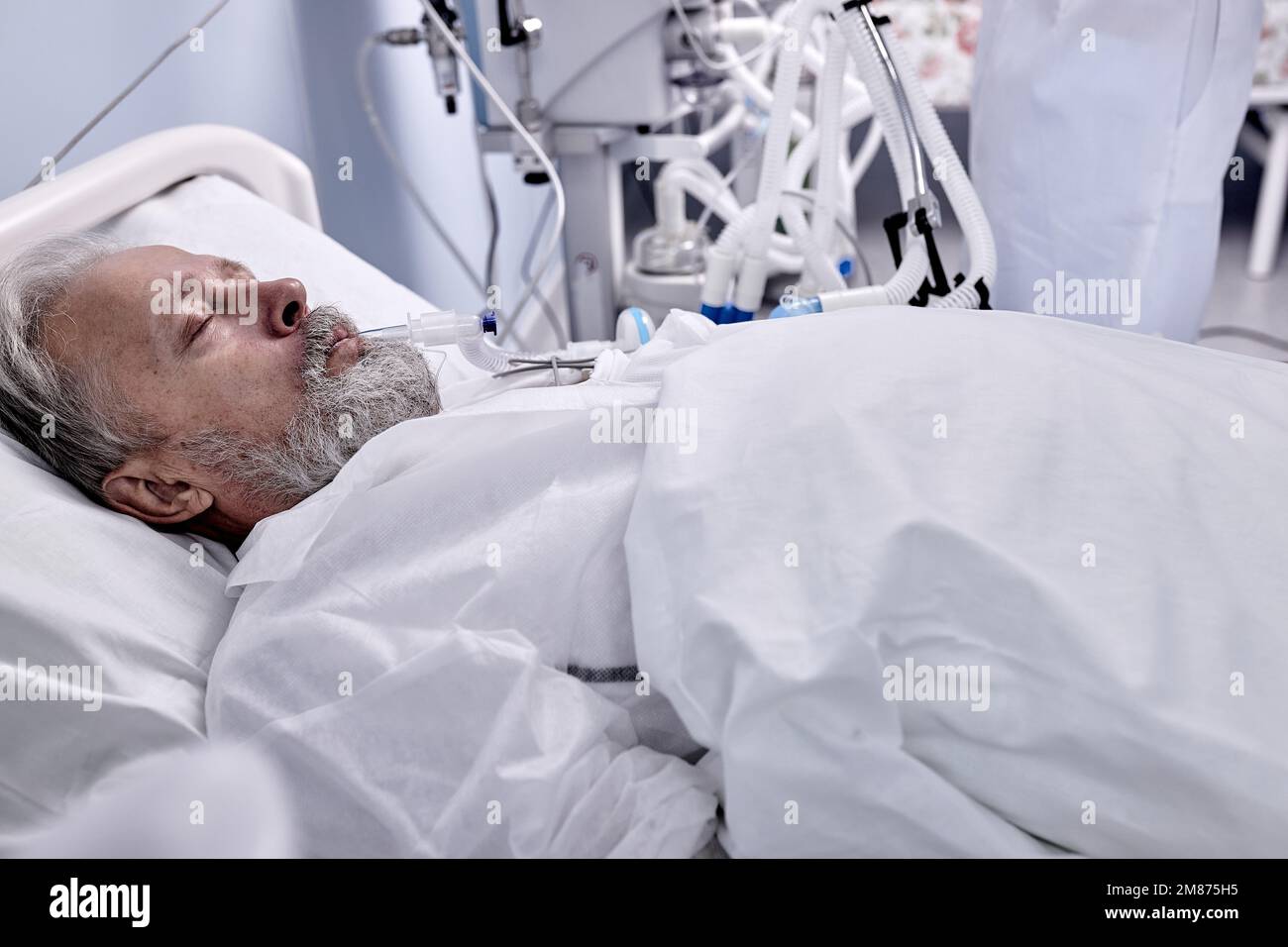Sick Caucasian European Man With Endotracheal Tube In Mouth Lying On ...