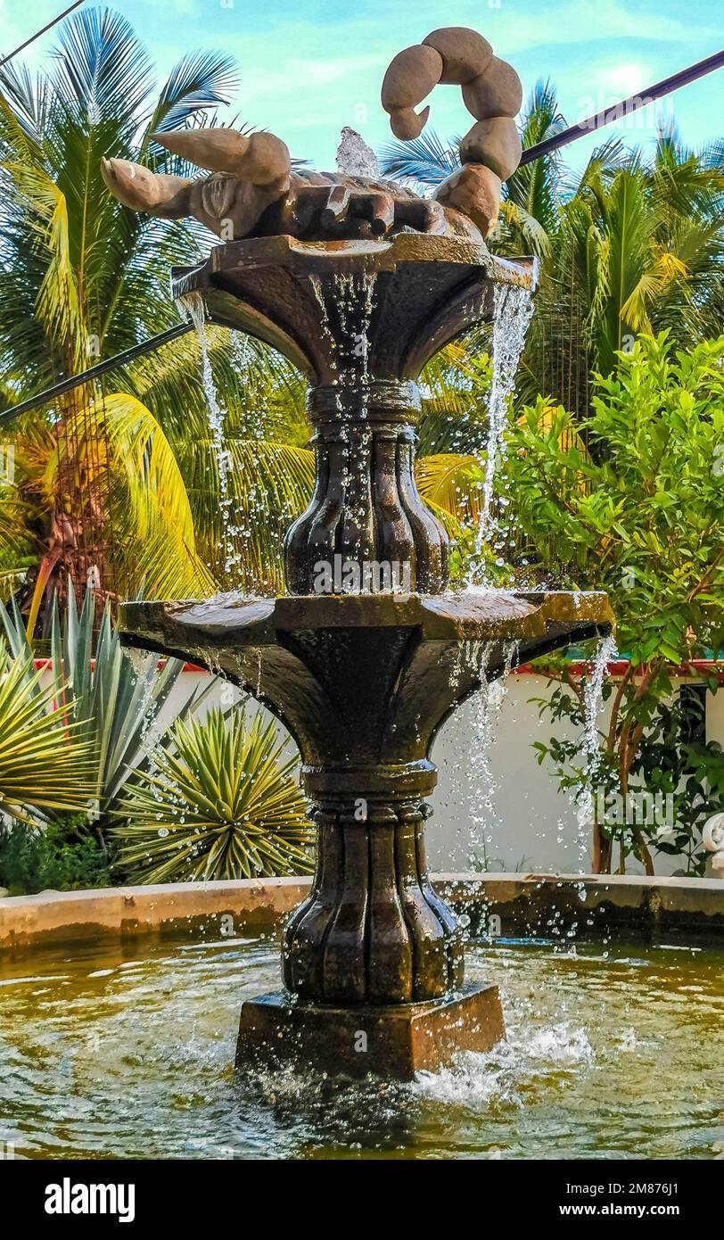 Fountain in the park with scorpion statue figure in Zicatela Puerto ...
