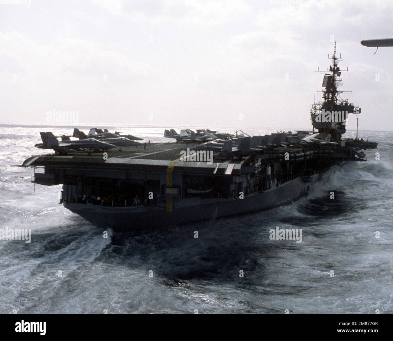 A stern bow view of the aircraft carrier USS MIDWAY (CV-41) underway in ...