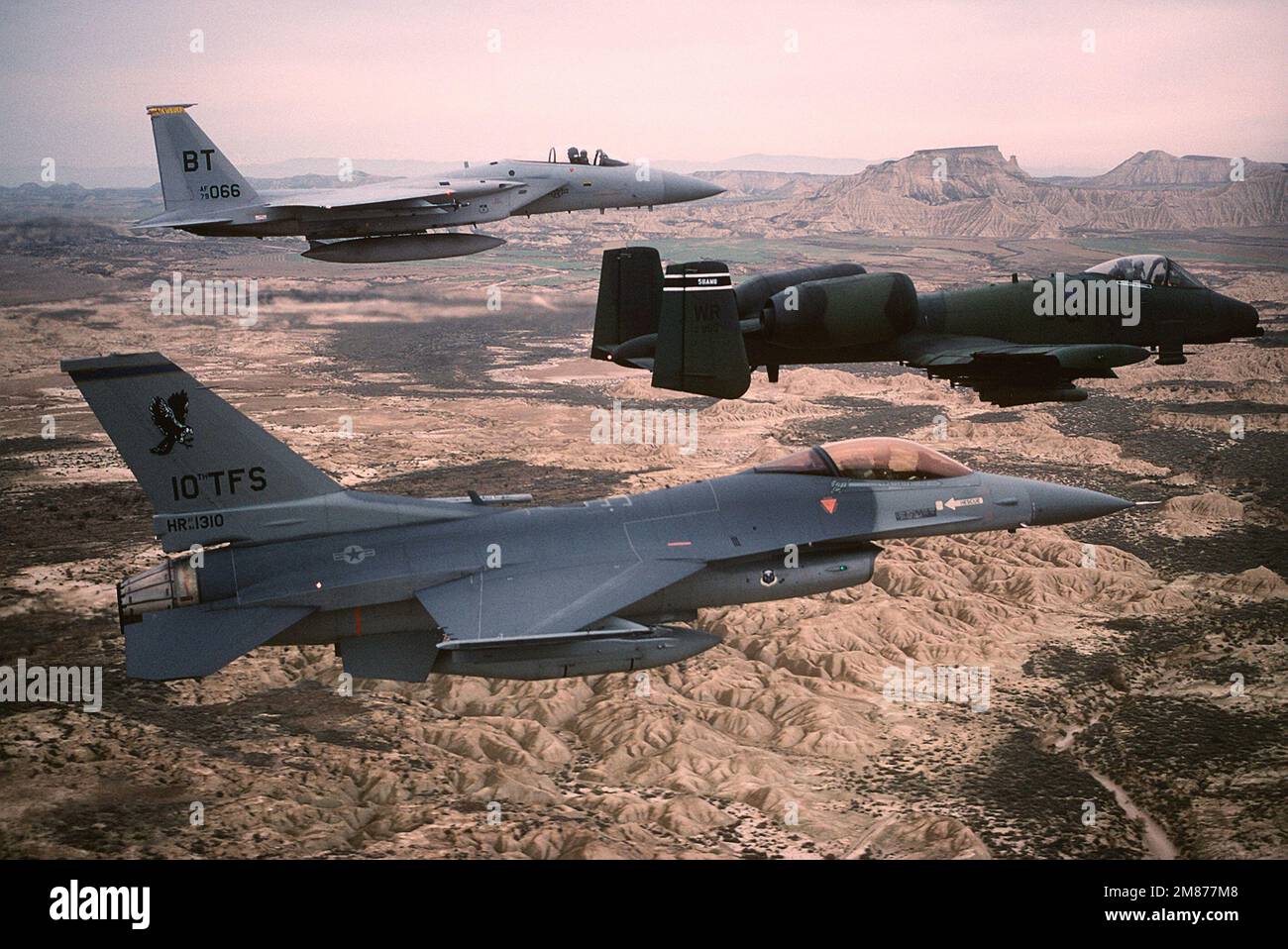 An air-to-air right view of, from front to back, a 10th Tactical ...