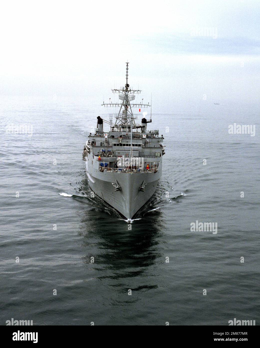 A bow view of the amphibious transport dock USS OGDEN (LPD 5) underway ...