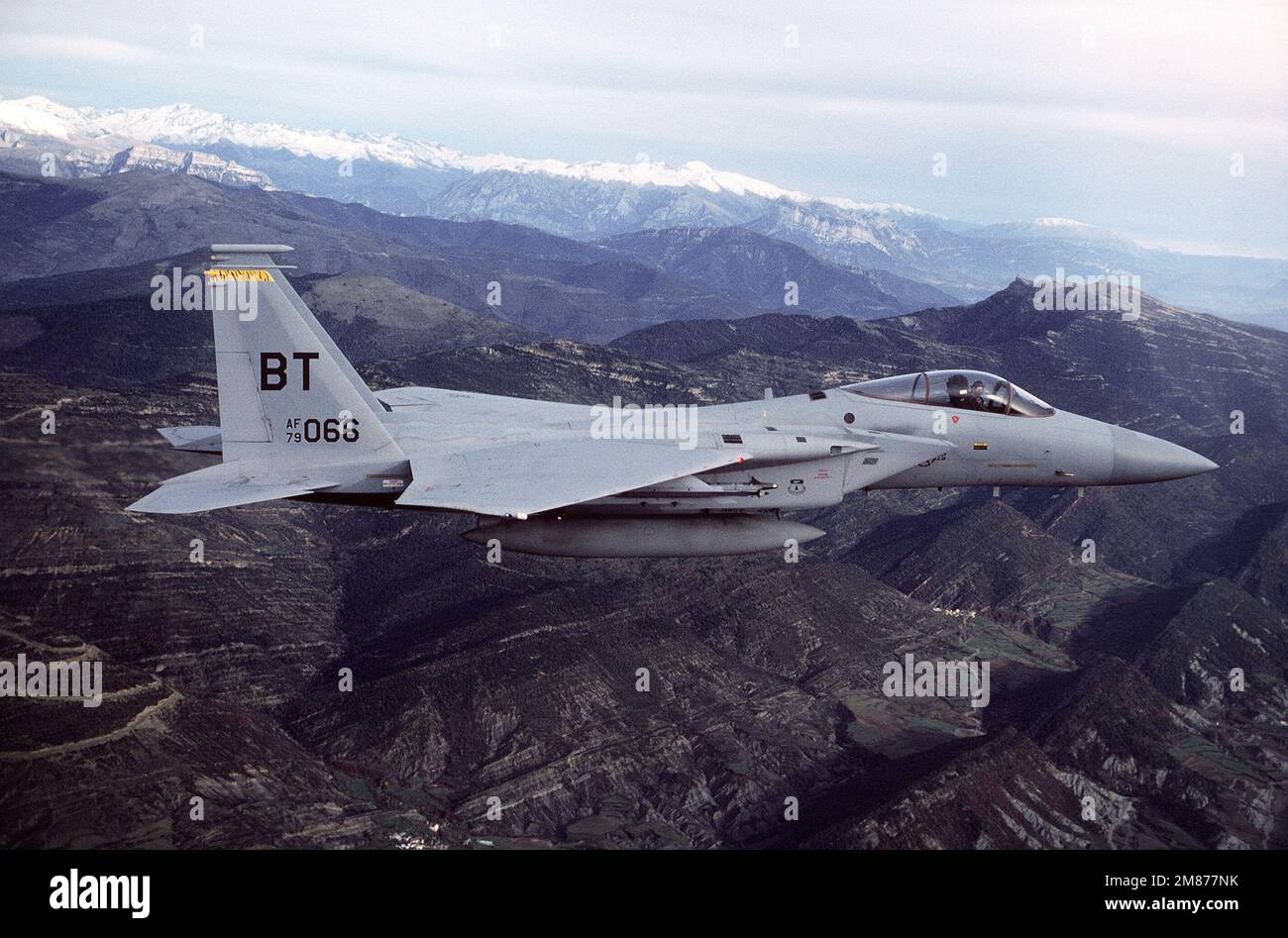 An air-to-air right side view of a 53rd Tactical Fighter Squadron F-15C ...