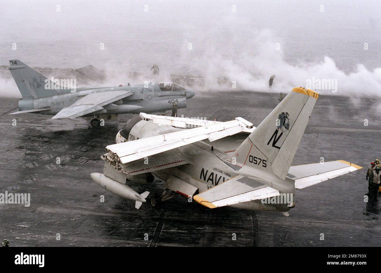 An A-7E Corsair II aircraft is moved into position for launch during ...