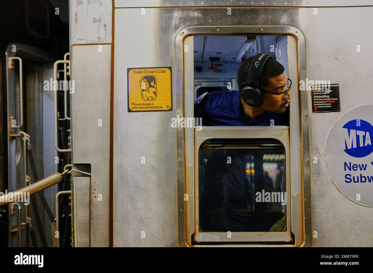 A New York City subway conductor looking out from train crew's cab when ...