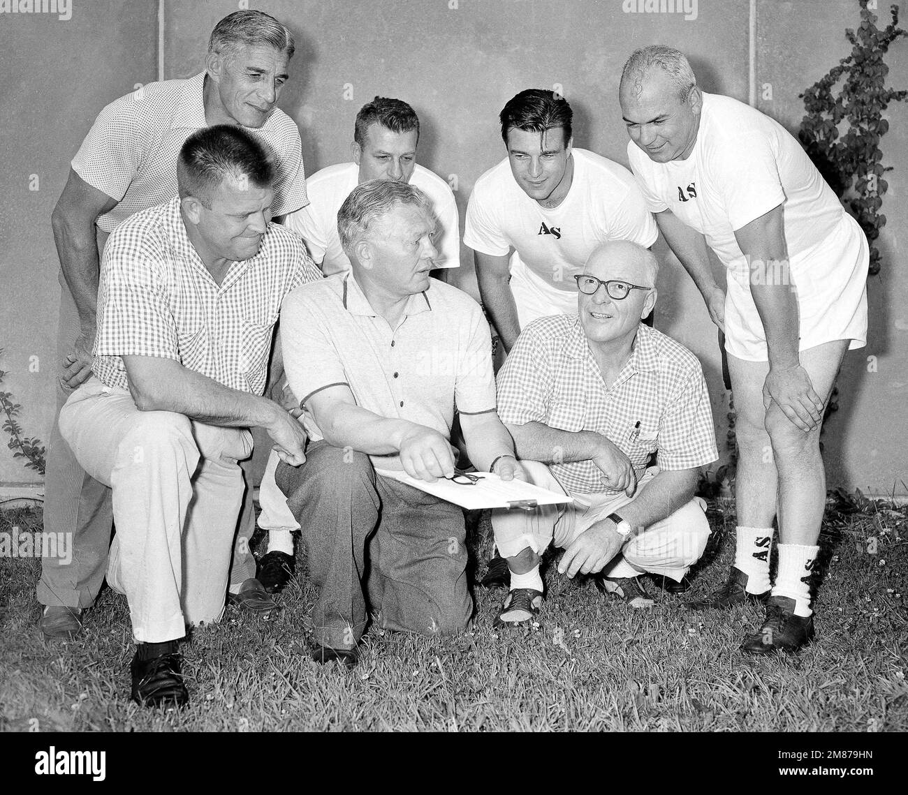 Curly Lambeau, front row, second from left, head coach of the College ...
