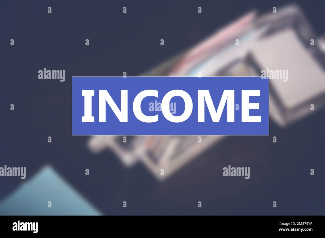 income word on blurring background Stock Photo - Alamy
