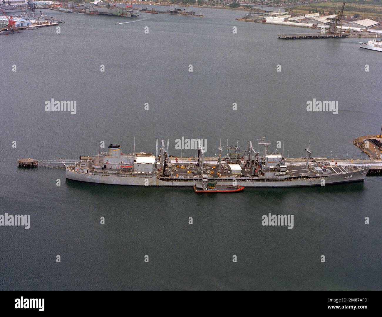 A starboard view of the fleet oiler USNS HASSAYAMPA (T-AO-145) moored ...