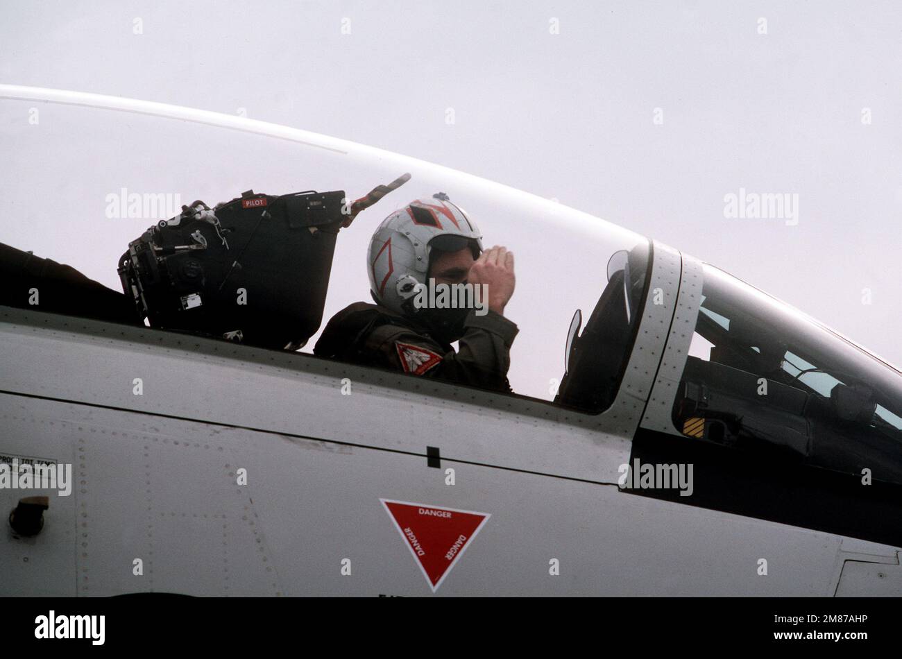 The pilot of a Fighter Squadron 102 (VF-102) F-14A Tomcat aircraft ...