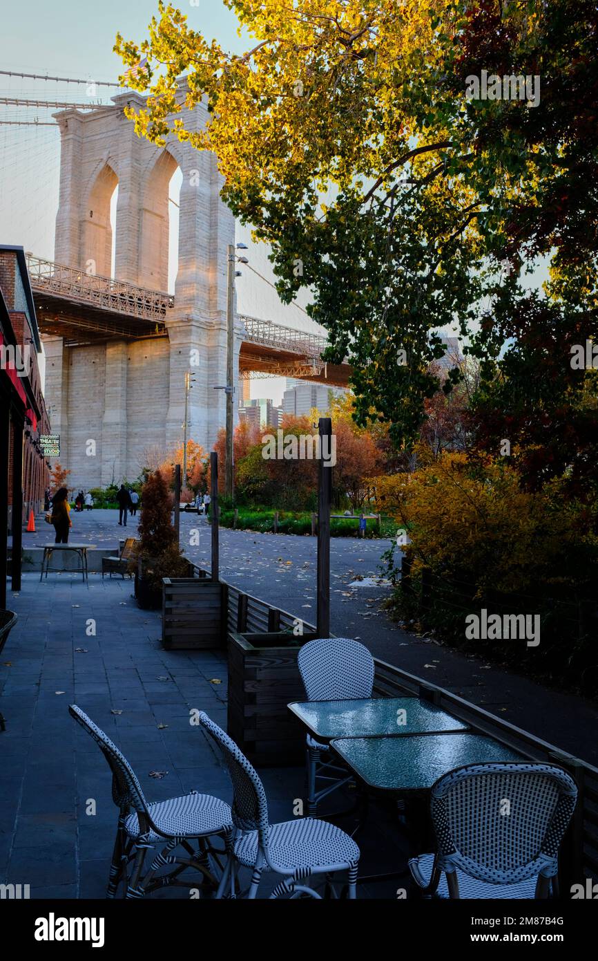 The Brooklyn Tower of Brooklyn Bridge under late afternoon sunlight in ...