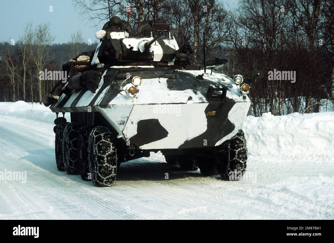 An LAV-25 light assault vehicle transports Marines through the ...