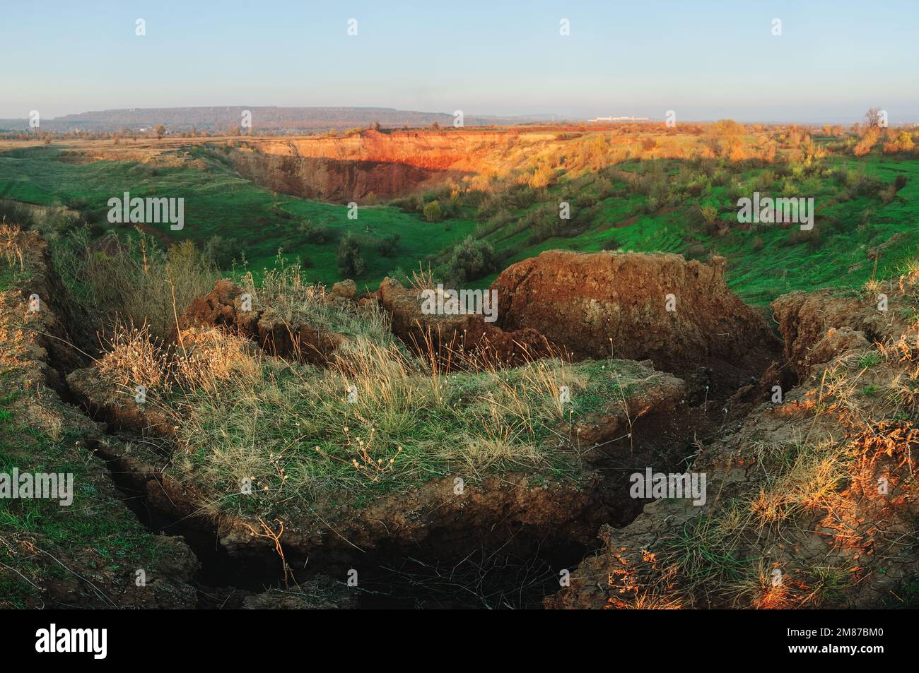 Landscape of collapsed sinkhole down. Collapsed ground islands rifts ...