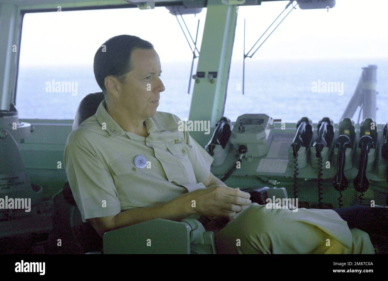 CAPT. Paul W. Parcells, commanding officer, watches flight operations ...
