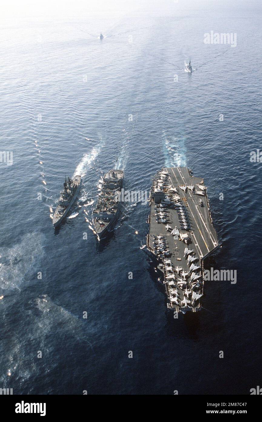 An aerial bow view of the nuclear-powered aircraft carrier USS NIMITZ ...