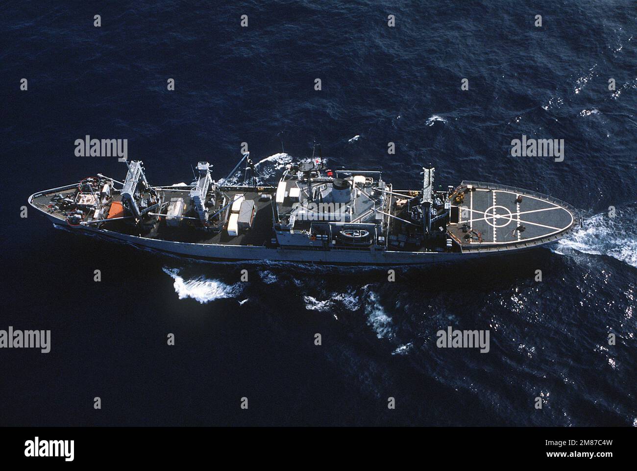 An aerial port beam view of the ammunition ship USS NITRO (AE-23 ...