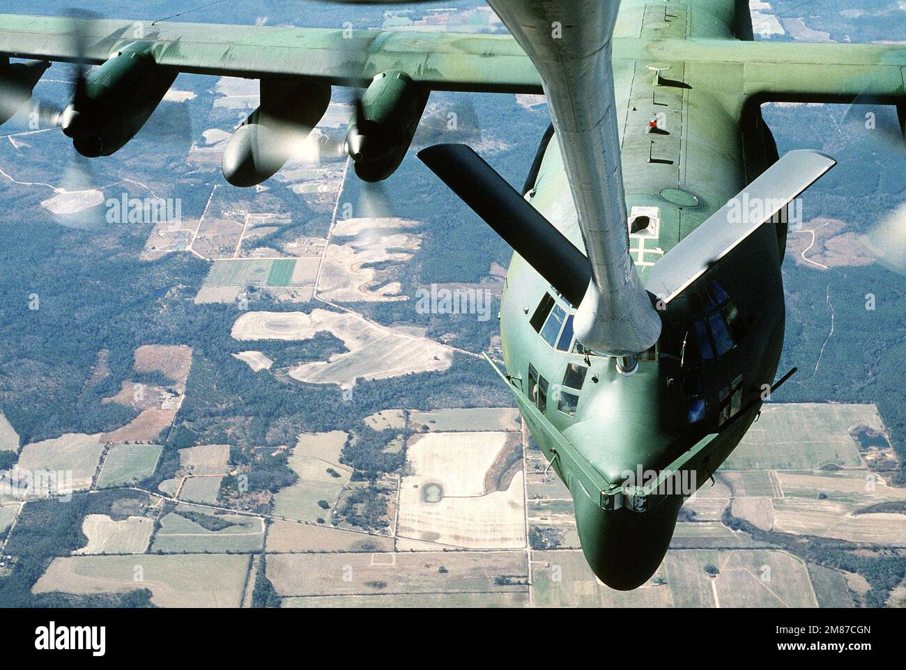 An air-to-air view of an MC-130E Hercules aircraft of the 8th Special ...