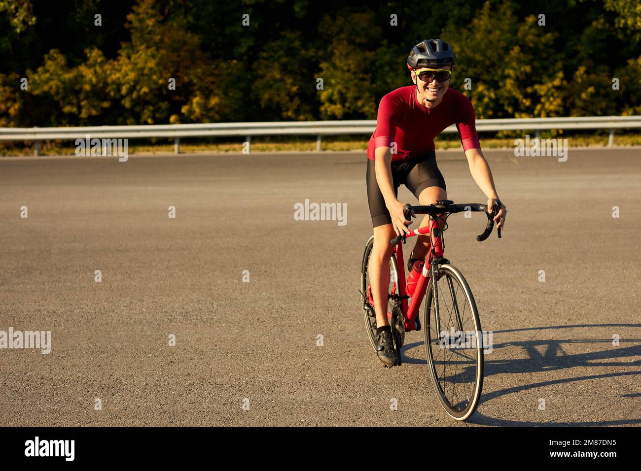 Riding adult cyclist pedaling hi-res stock photography and images - Alamy