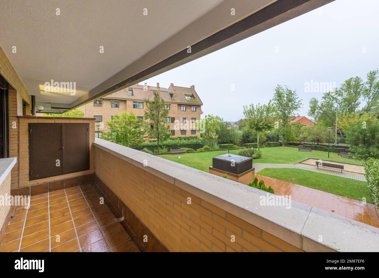Balcony-type terrace of a house with views of common garden areas on a ...