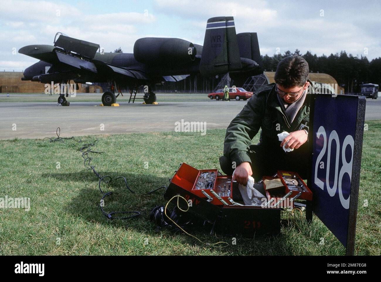 A member of the 91st Aircraft Maintenance Unit (91st AMU) organizes his ...