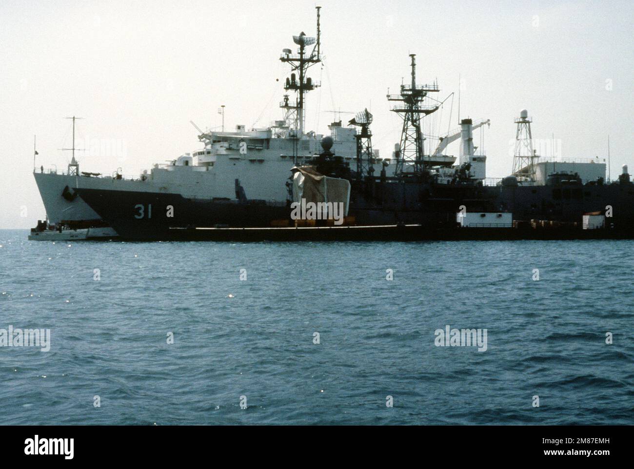 A view of the guided missile frigate USS STARK (FFG-31) with the ...