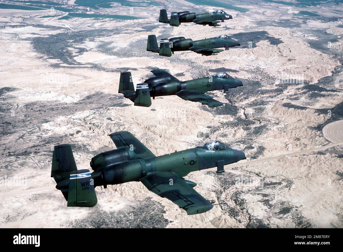 An air-to-air right side view of 91st Tactical Fighter Squadron A-10A ...