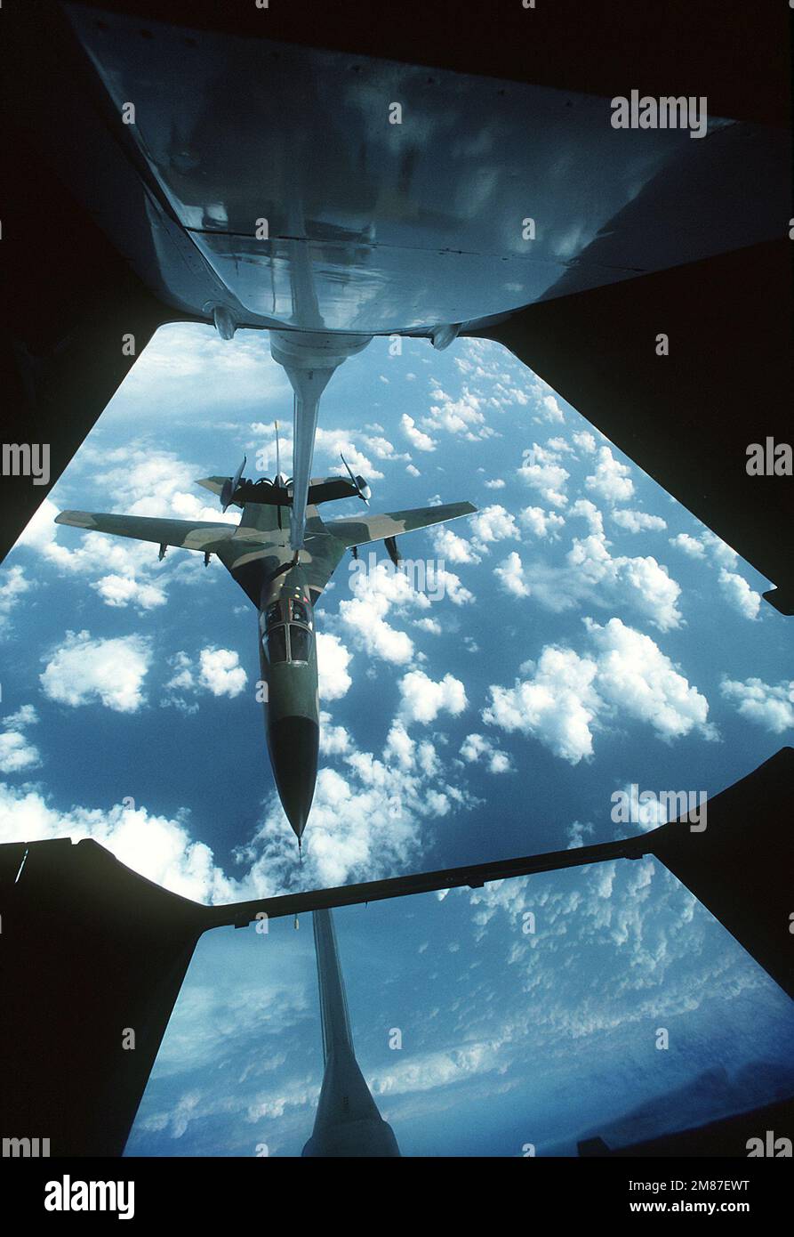 An air-to-air overhead view of a 48th Tactical Fighter Wing F-111F ...
