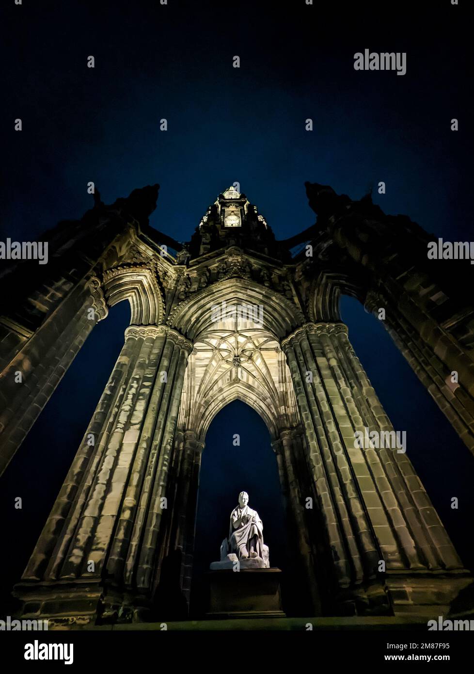 A vertical shot of the Scott Monument is a Victorian Gothic monument to ...