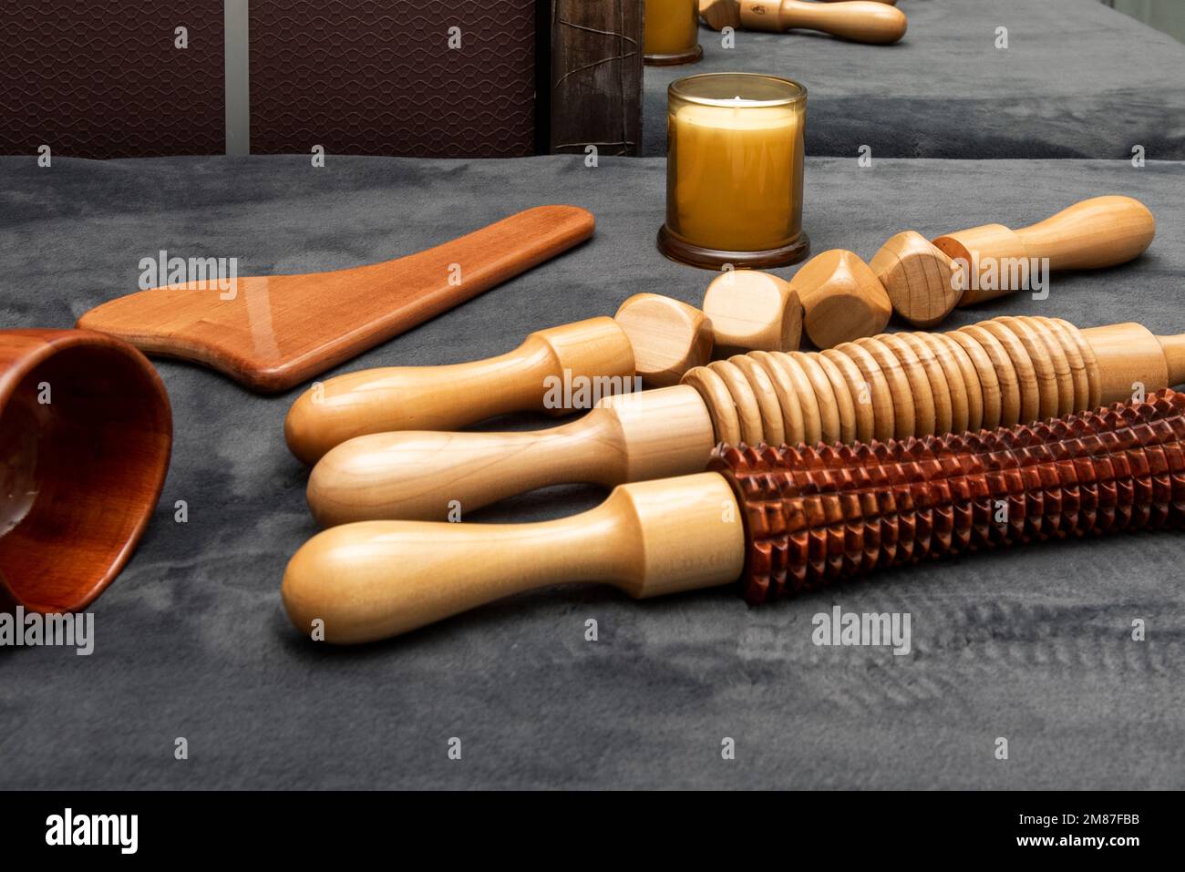 Wooden devices to apply wood therapy massages with rollers and candles ...