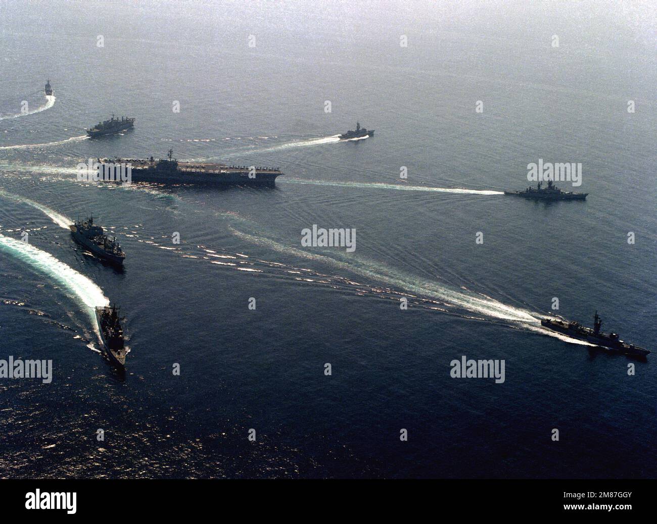 An aerial starboard view of the aircraft carrier USS KITTY HAWK (CV-63 ...