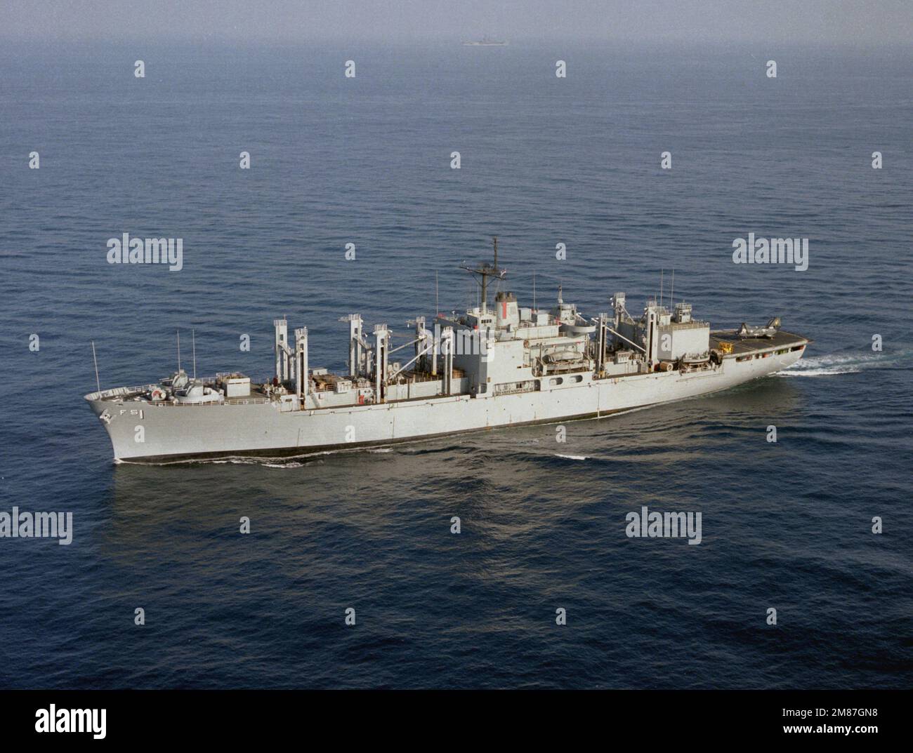 An aerial port bow view of the combat stores ship USS MARS (AFS-1 ...