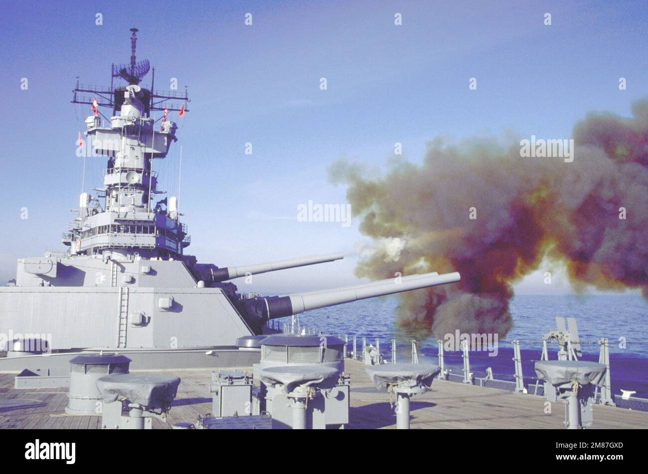 A round is fired from the No. 2 Mark 7, 16-inch ,50 caliber gun turret ...