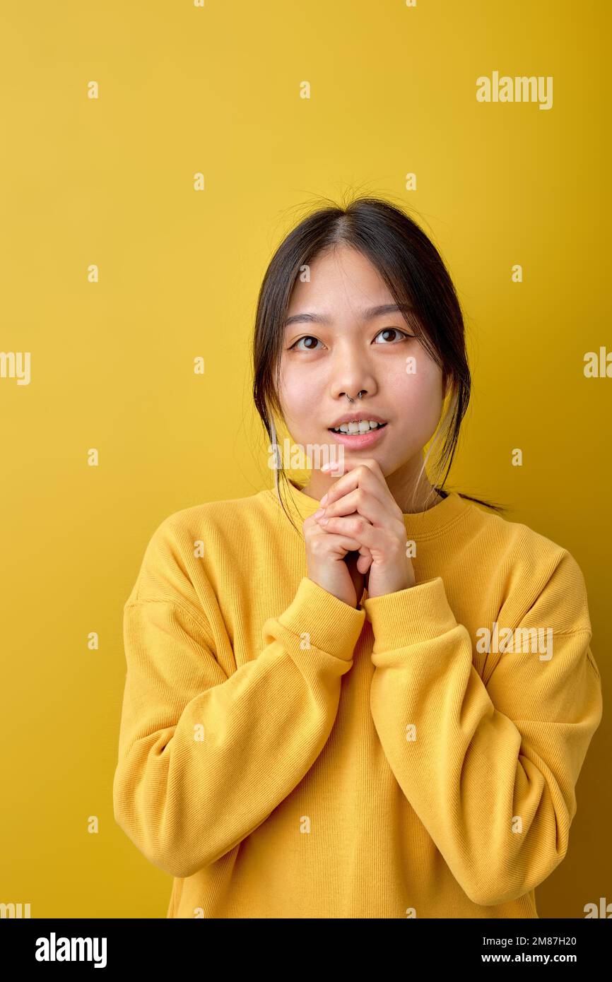 happy asian woman keep hands together looking up dreaming, human ...