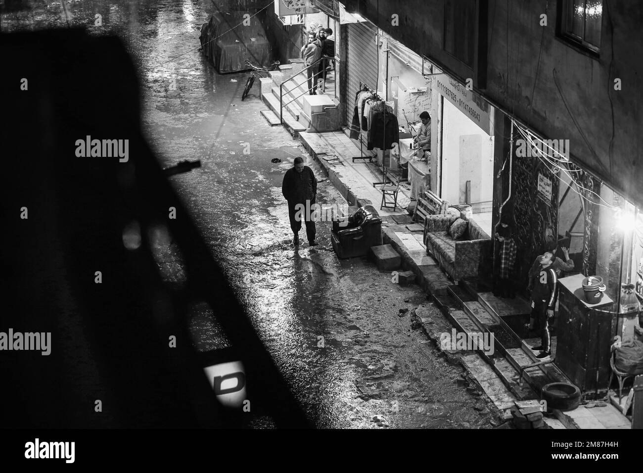 Sad Man Walking In The Rain