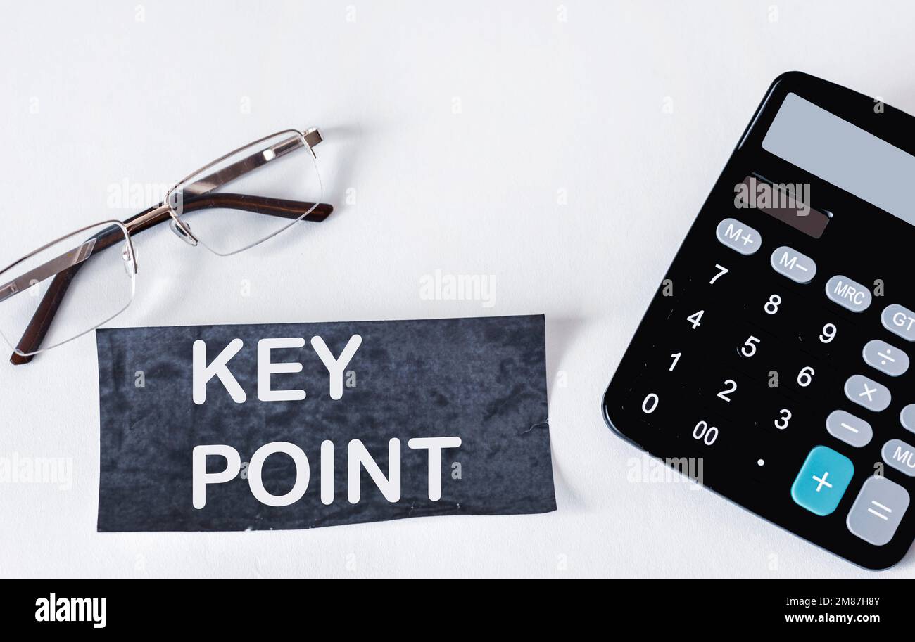 text KEY POINT on texture background of short note with glasses and ...