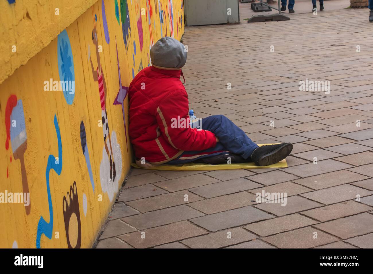 Bratislava, Slovakia - 01.07.2023: Homeless poor man sits on the ...