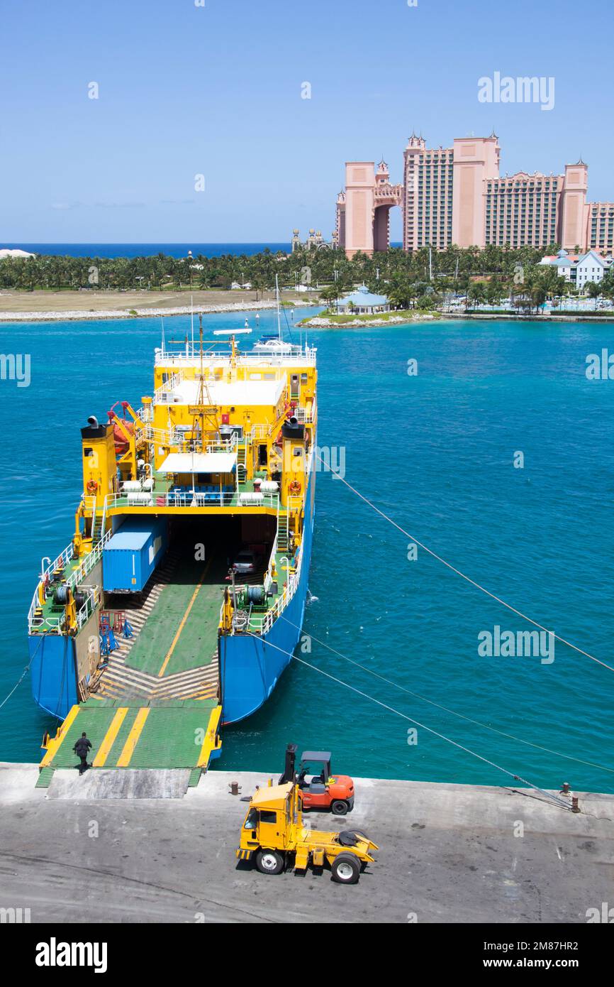 The aerial view of an industrial ship getting loaded in Nassau Harbour ...