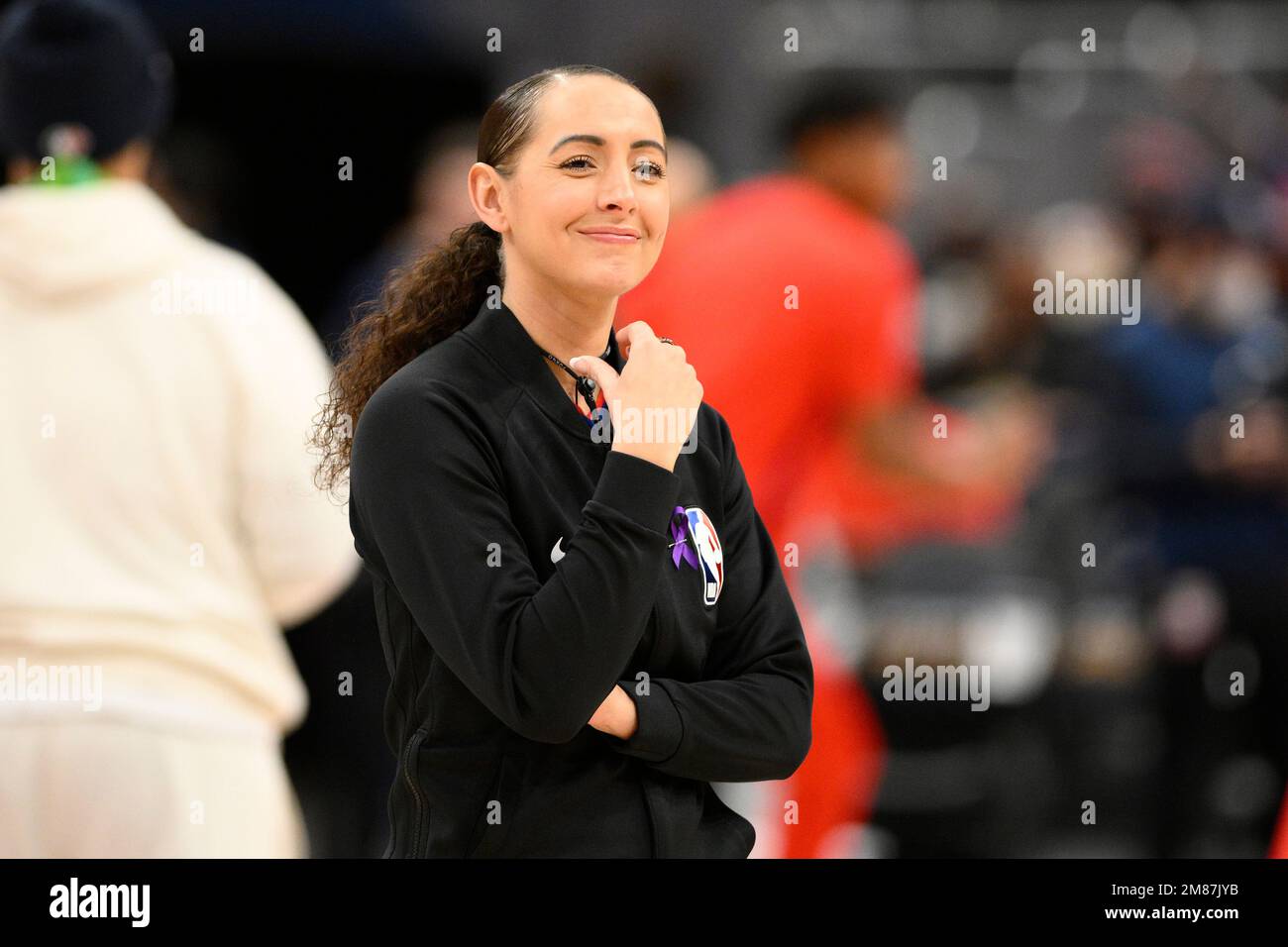 NBA referee Ashley Moyer-Gleich (13) looks on before an NBA basketball ...