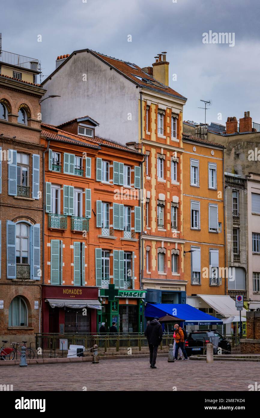 Saint Etienne square with its shops and brick facades in Toulouse old ...