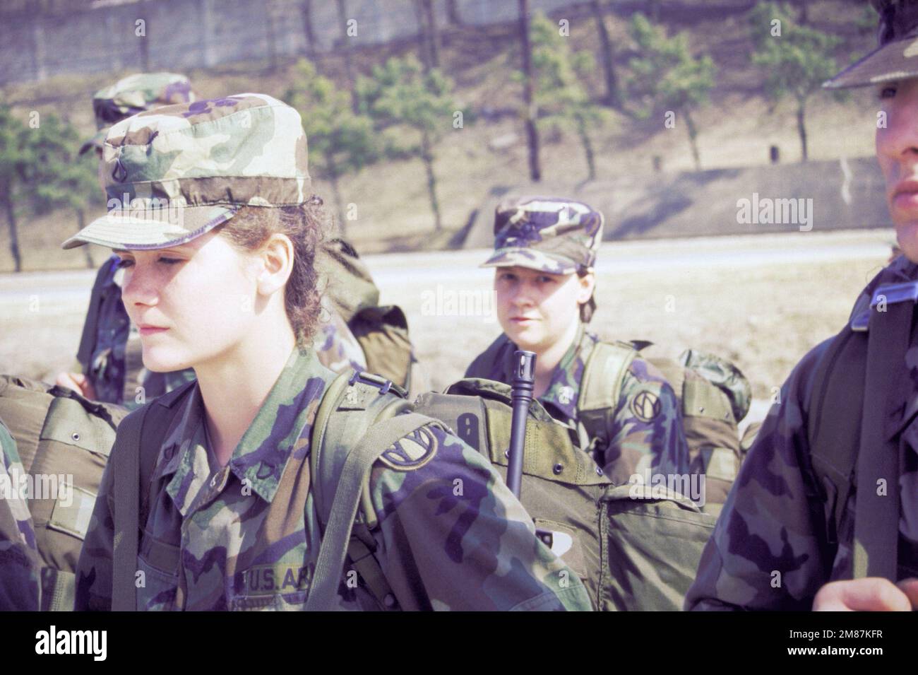 Members of the 346th Military Police Company stand in formation on the ...