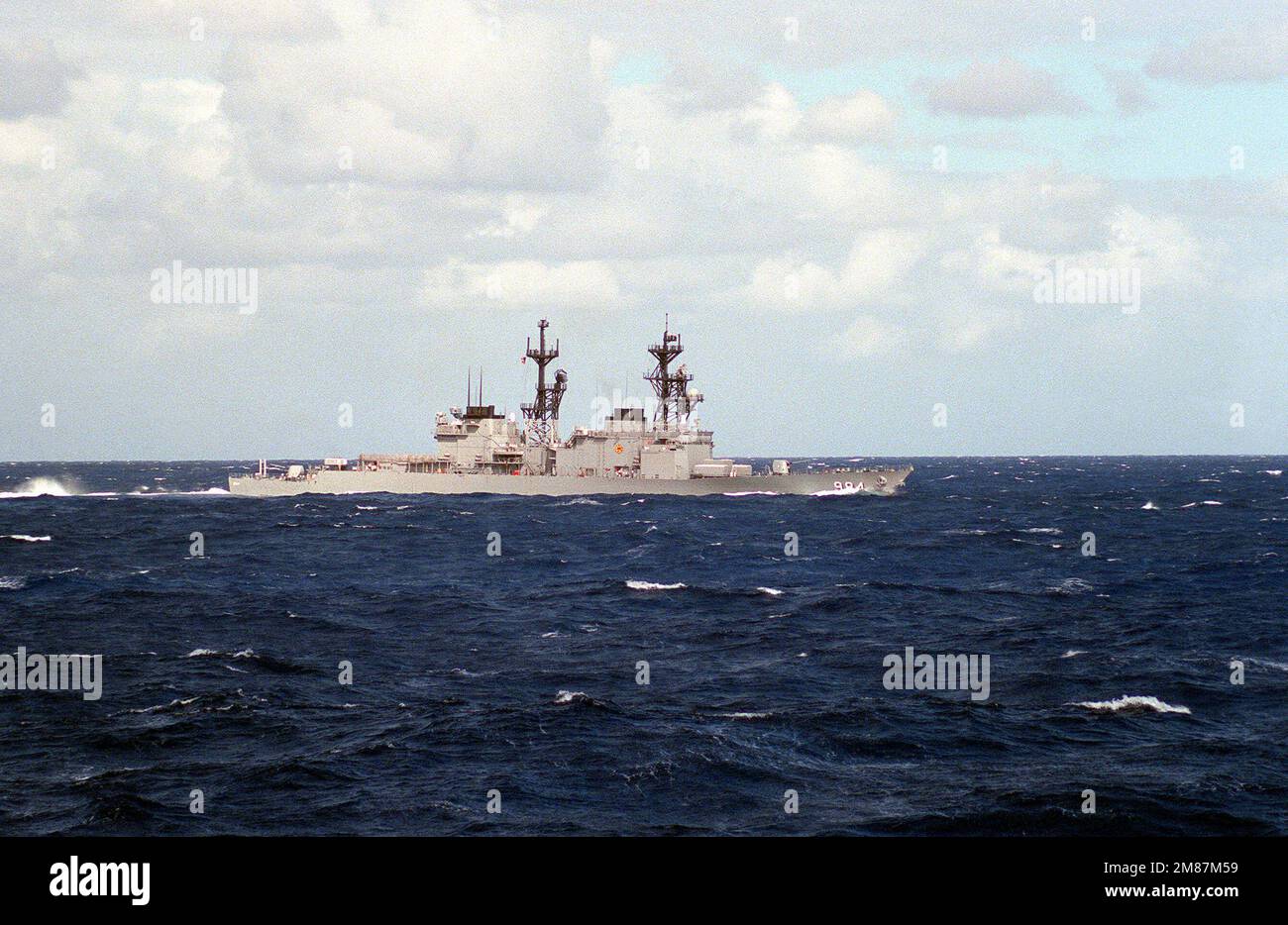 A starboard beam view of the destroyer USS LEFTWICH (DD-984) underway ...