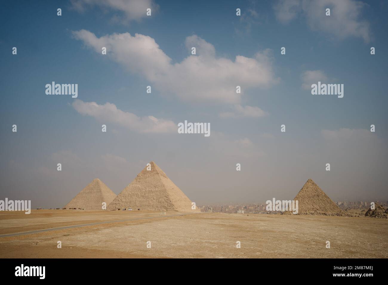 The great pyramids of Giza at Egypt in a sunny day with clouds Stock ...